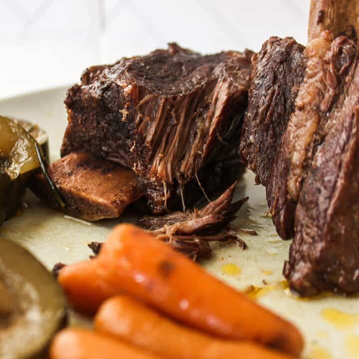 Red Wine Dutch Oven Braised Short Ribs - Nomaste Hungry