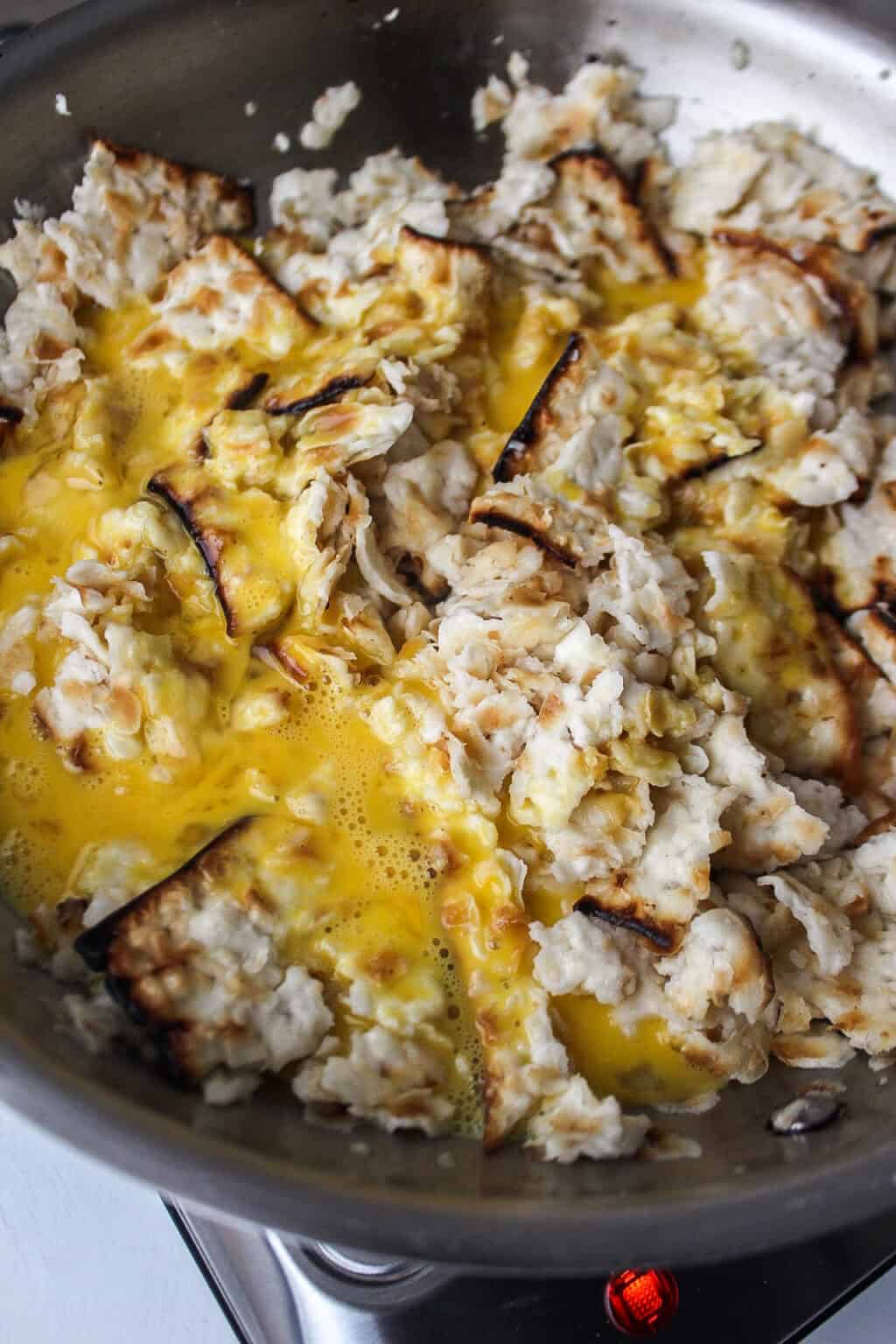 Simple Savory Matzo Brei Recipe (Egg Fried Matzo) - Nomaste Hungry