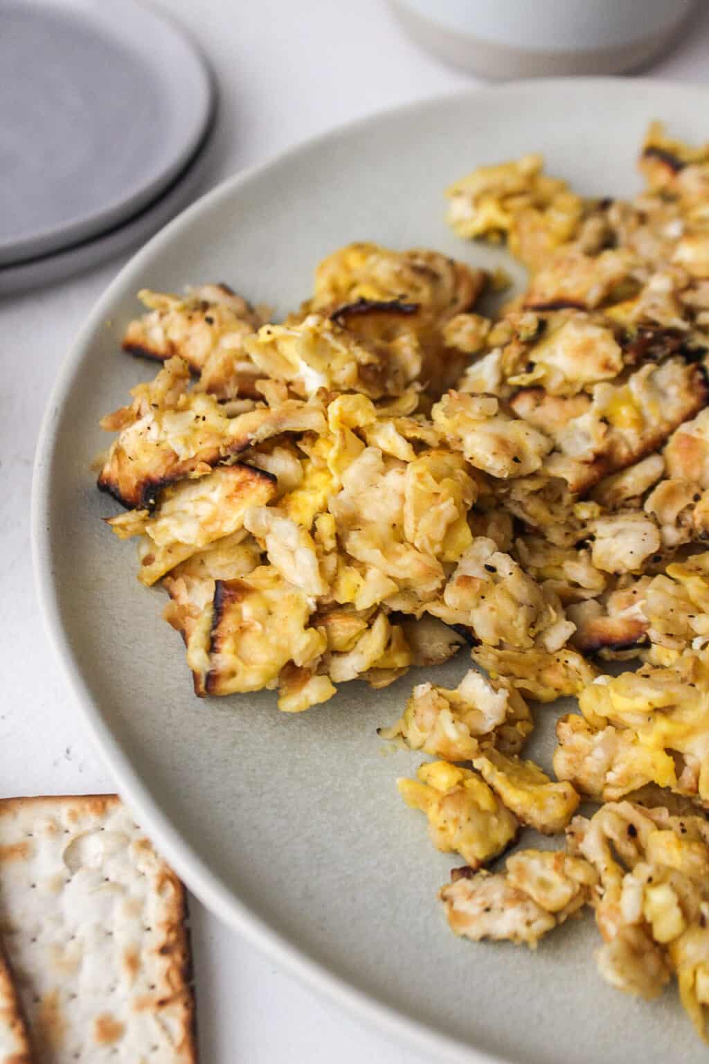 Simple Savory Matzo Brei Recipe (Egg Fried Matzo) - Nomaste Hungry