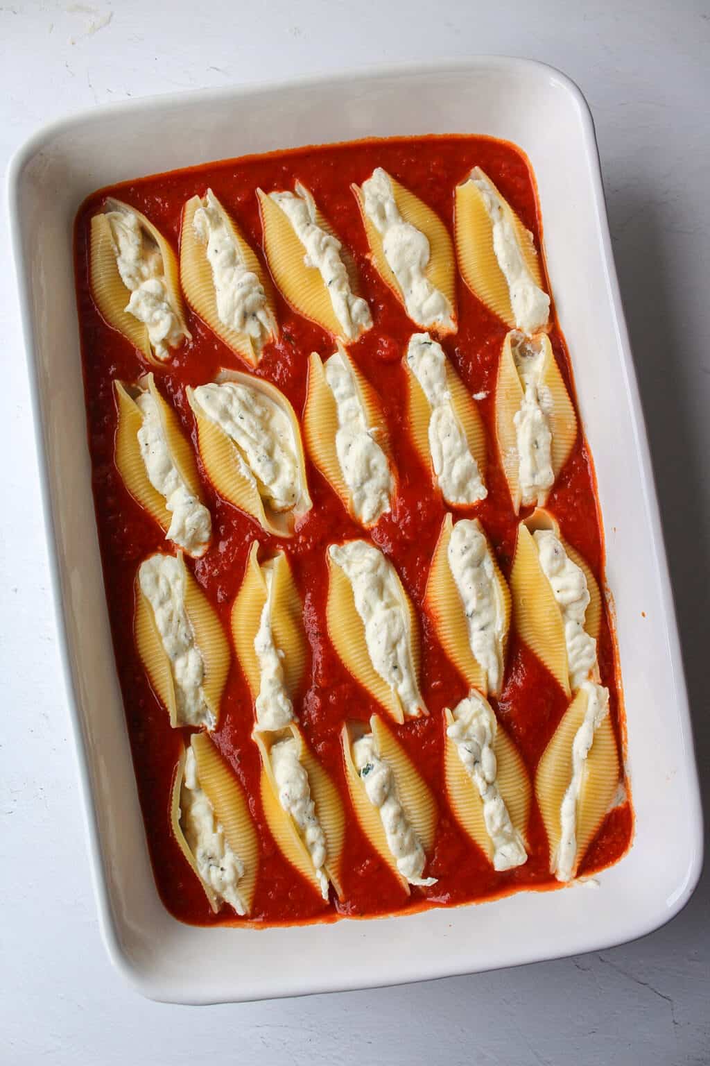 How to Make Classic Baked Stuffed Shells Recipe - Nomaste Hungry